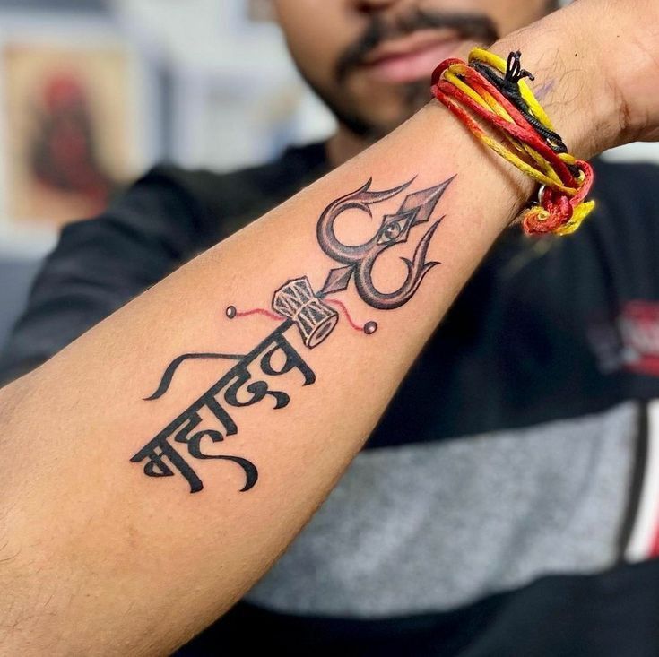 Trishul Symbol In Hand 65 Modern Om Tattoo Designs And Ideas For Men
